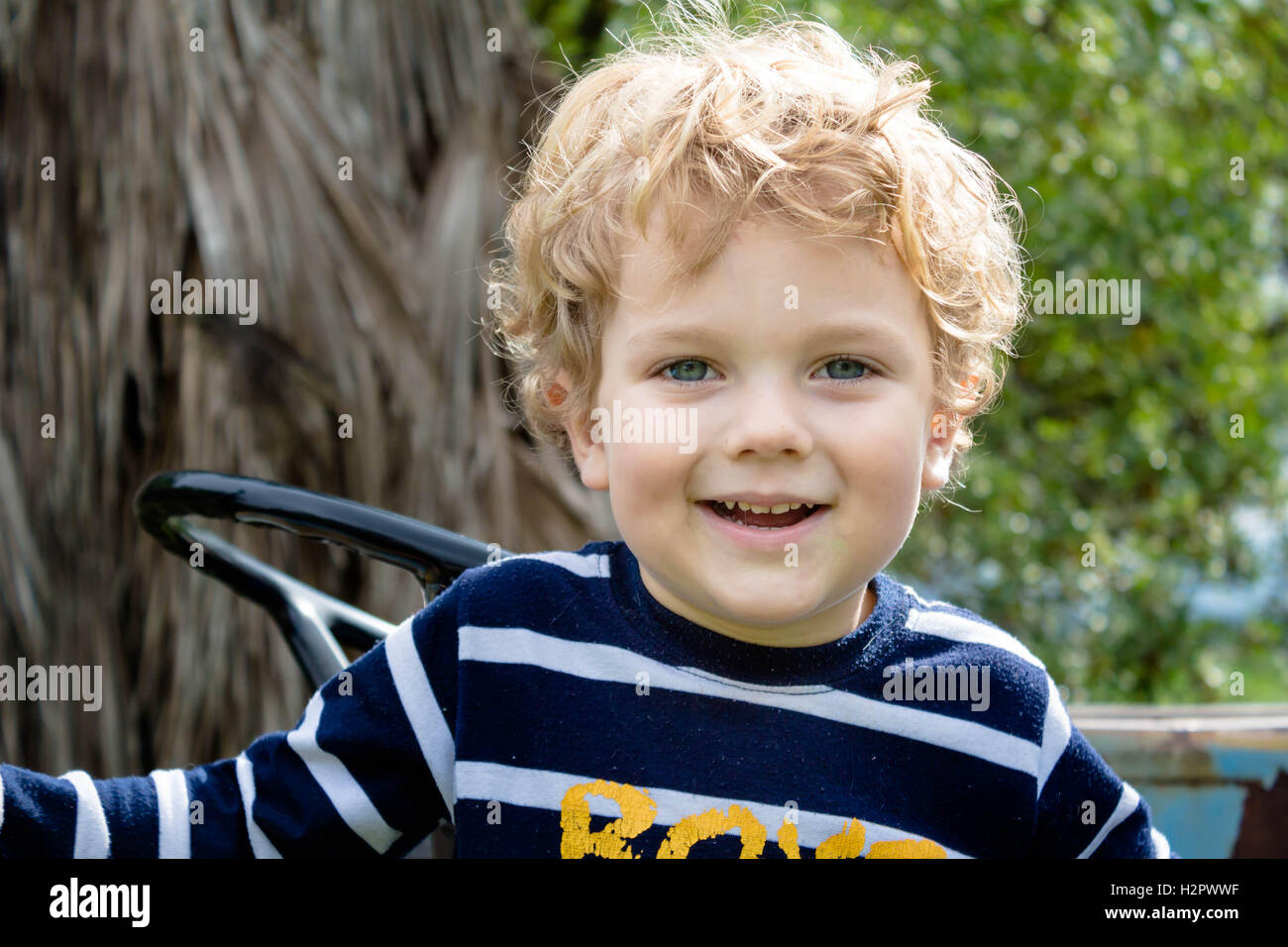 Boy and tractor hi-res stock photography and images - Alamy