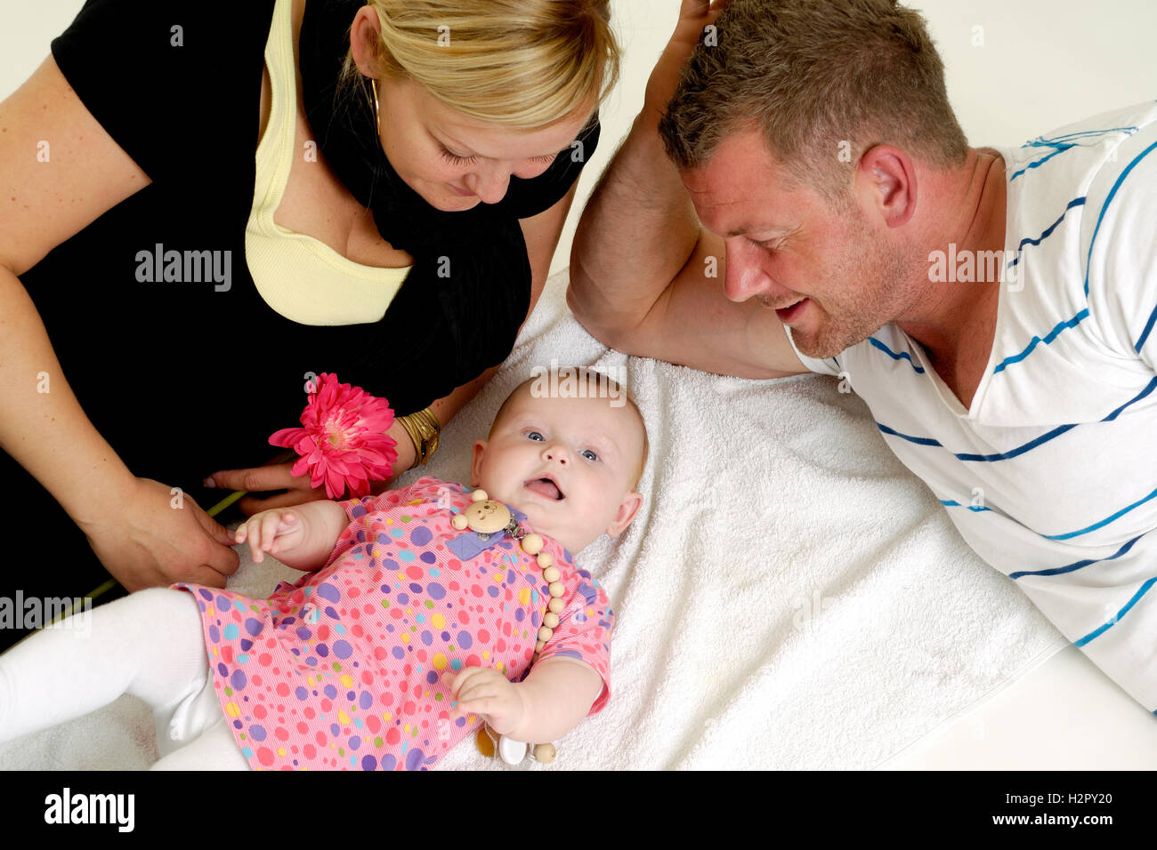 Mother father and baby Stock Photo - Alamy