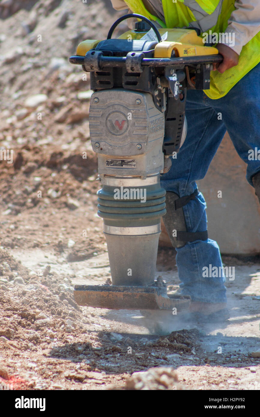 A Man Operates a Jack Hammer Stock Photo - Alamy