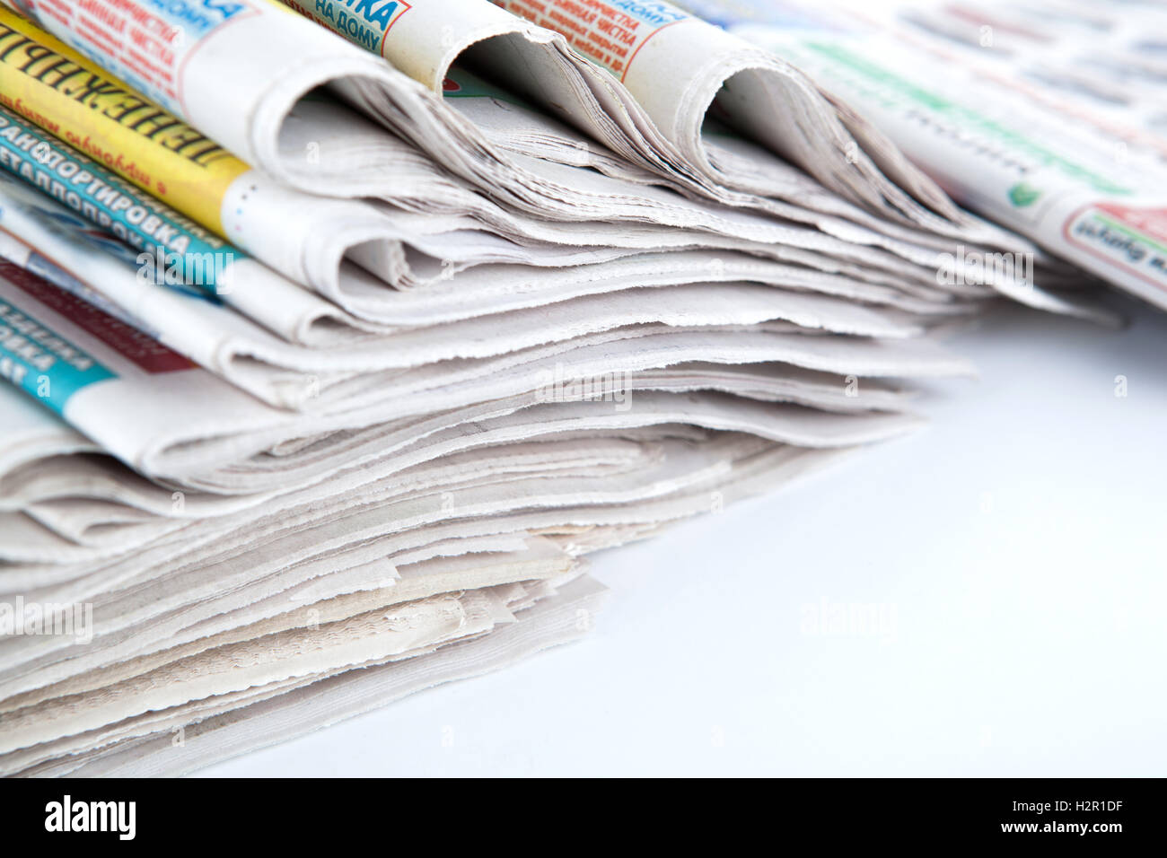 stack of newspapers close-up Stock Photo - Alamy