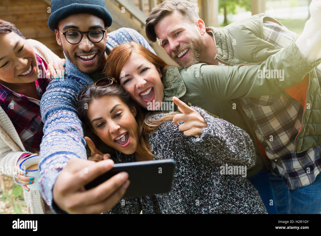 African woman pointing camera using hi-res stock photography and images ...