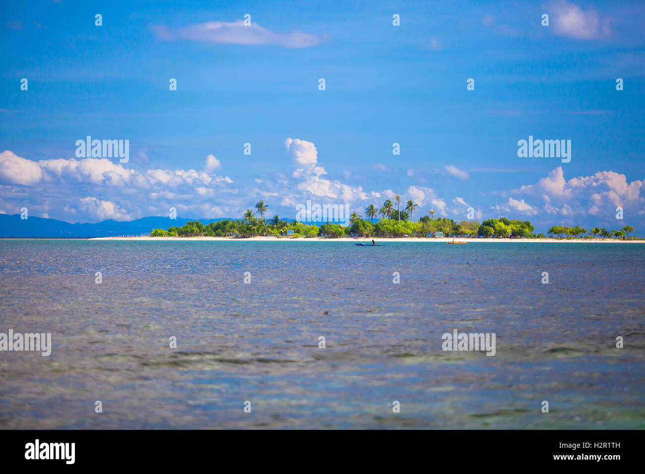 Tropical perfect island background the blue sky Stock Photo - Alamy
