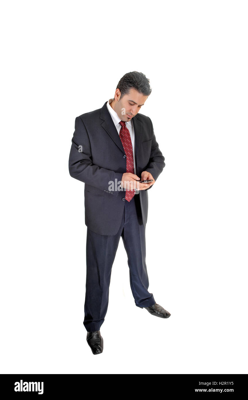 A tall handsome businessman standing for white background in a blue ...