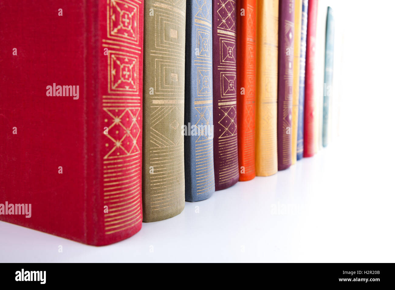 stack of books on white Stock Photo - Alamy