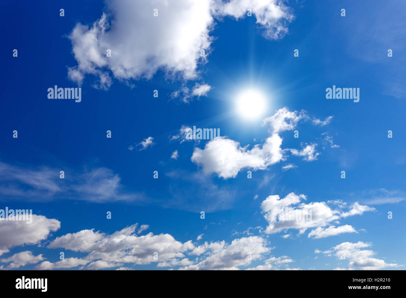 Blue sky with sun Stock Photo - Alamy