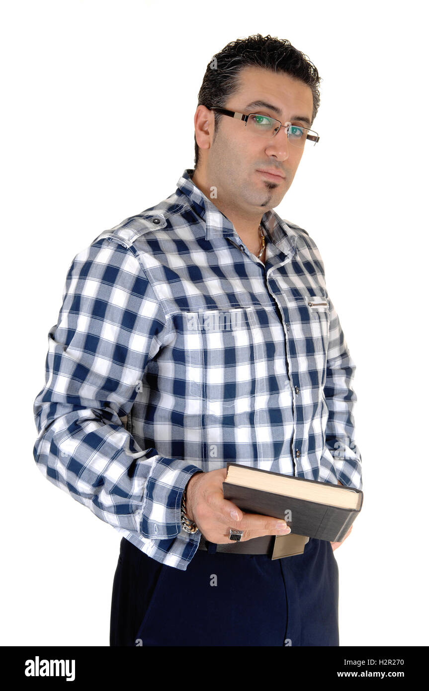 A young handsome man standing for white background very relaxed with a ... A young handsome man standing for white background very relaxed with a ...