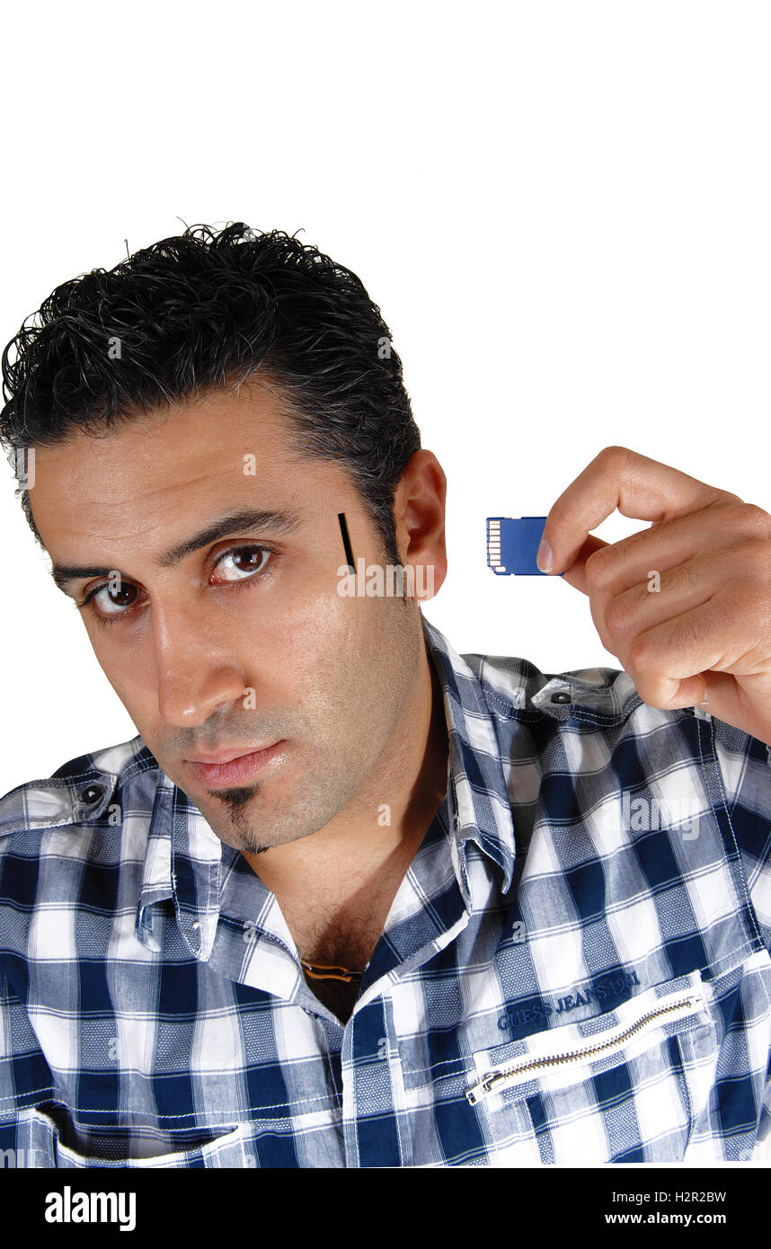 A close up picture of a young man try to put more memory in his brain ...