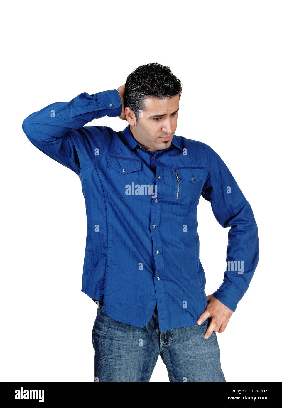 A portrait picture of a serious young handsome man looking down with ...