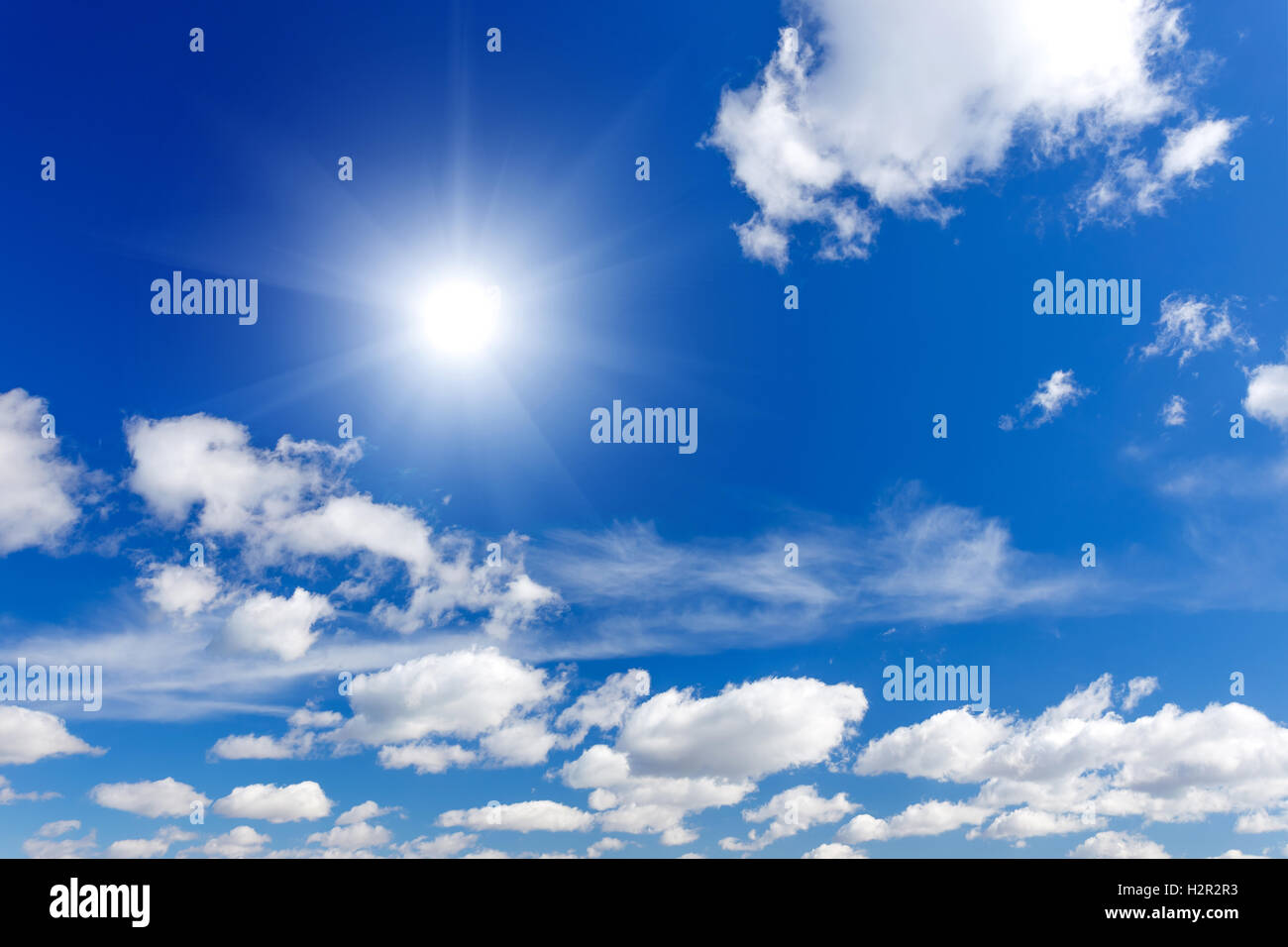 Blue sky with sun Stock Photo - Alamy