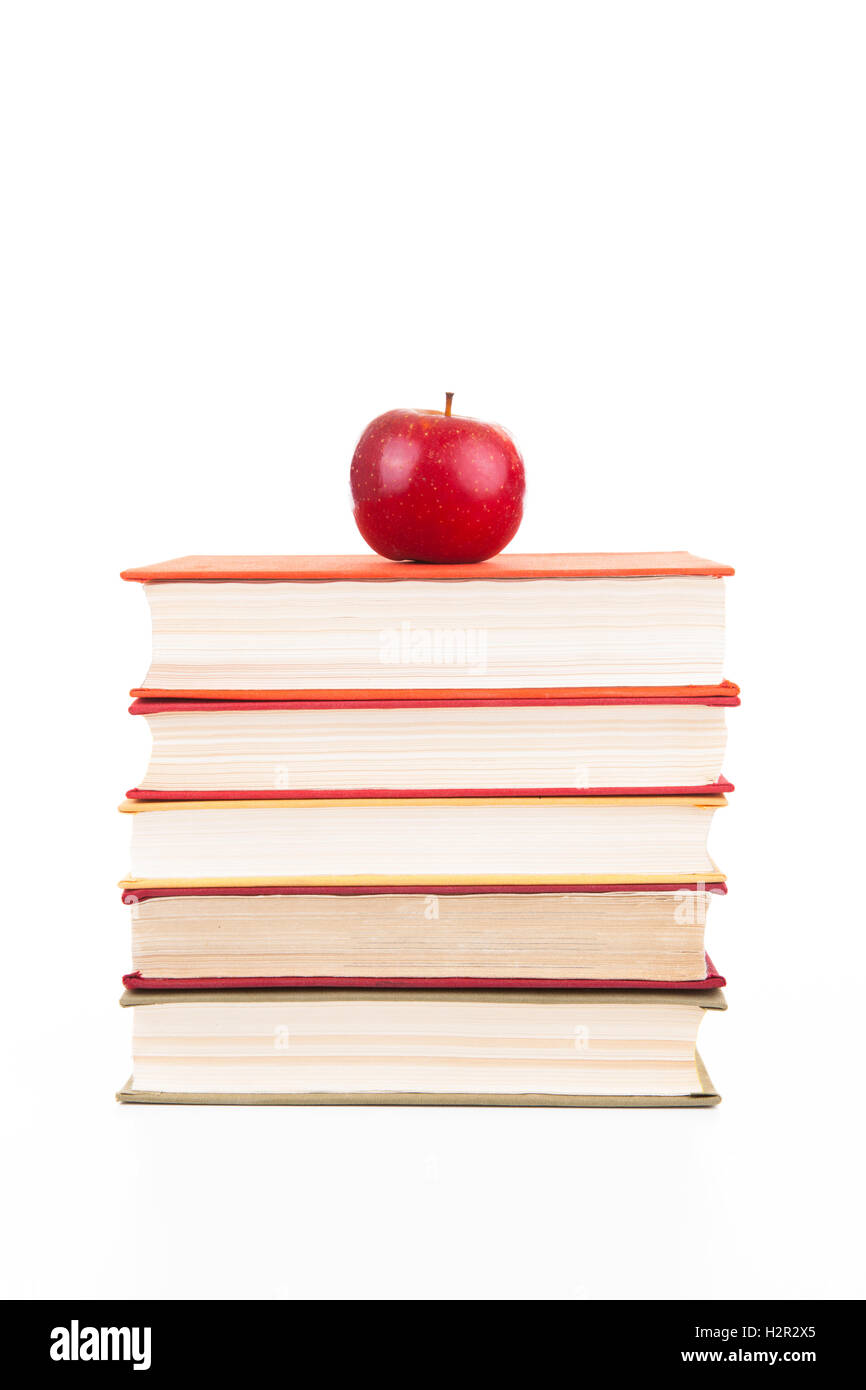 stack of books with red apple Stock Photo - Alamy
