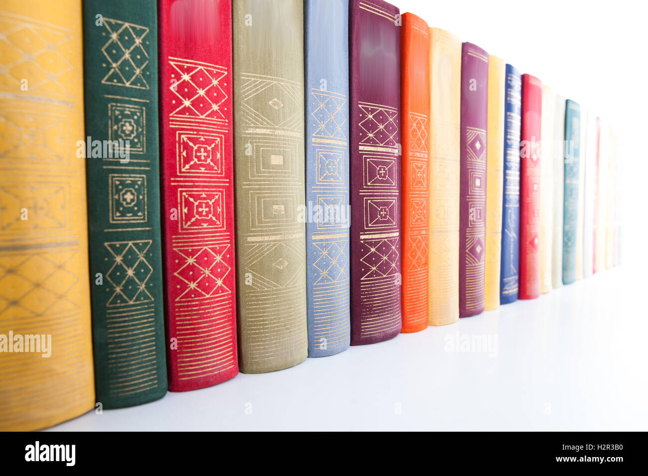 stack of books on white Stock Photo - Alamy