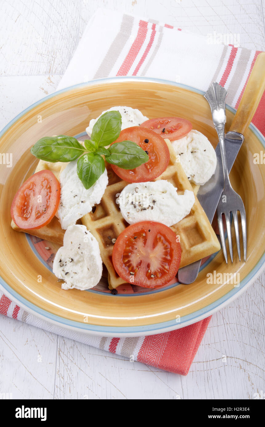home made waffle with cheese and tomato Stock Photo - Alamy