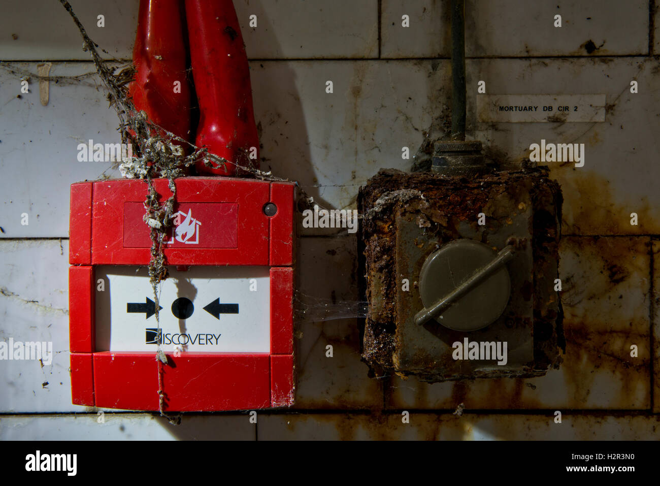 Rusty electrical switch and fire alarm within St Ann's Hospital ...