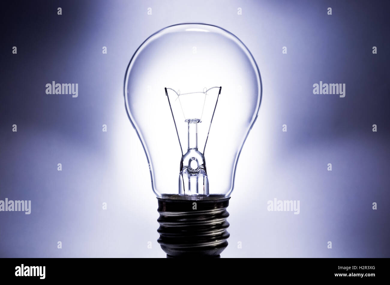 Electric light bulb with light background Stock Photo - Alamy