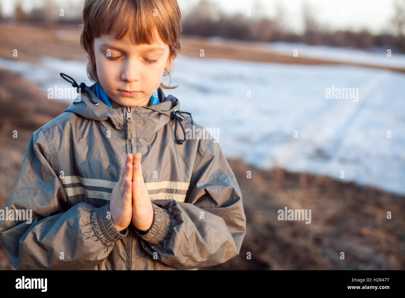 boy at prayer Stock Photo - Alamy