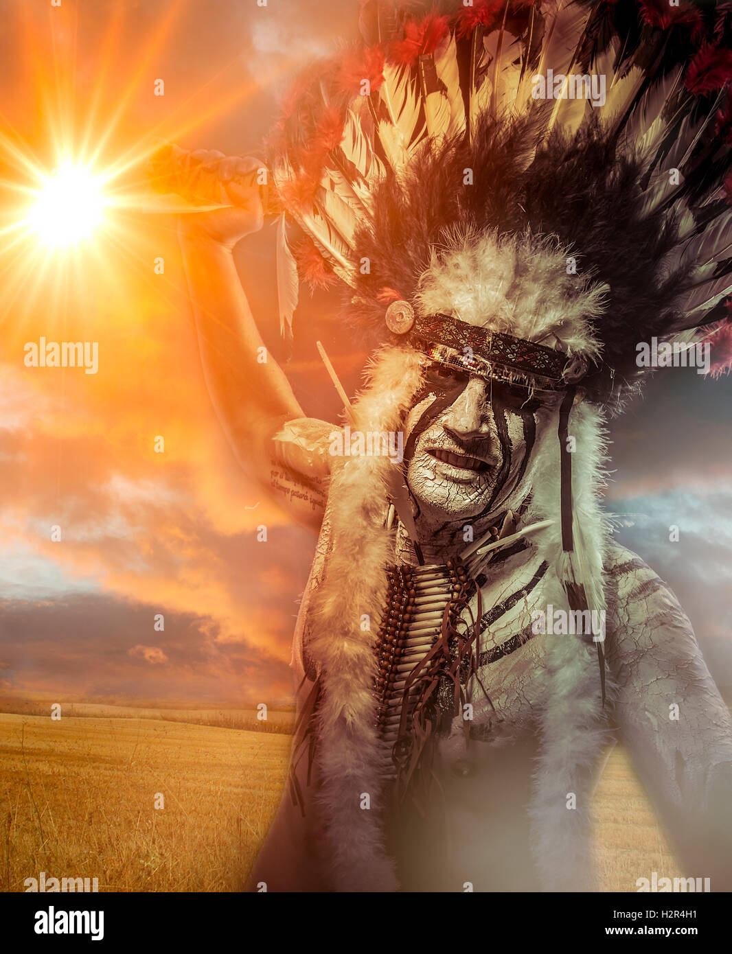 American Indian warrior, chief of the tribe, sunset. man with fe Stock ...