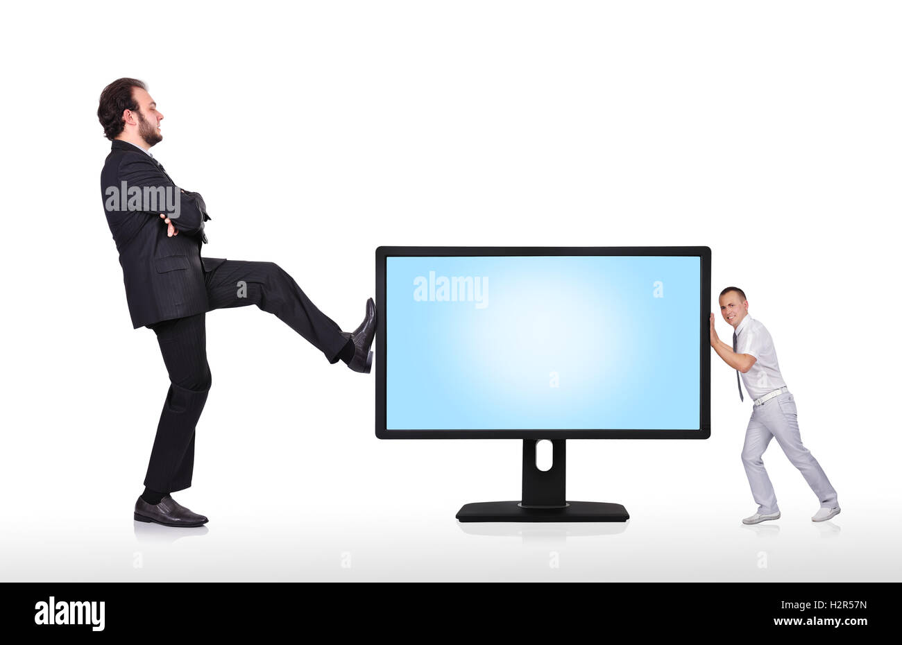 pushing big monitor Stock Photo - Alamy