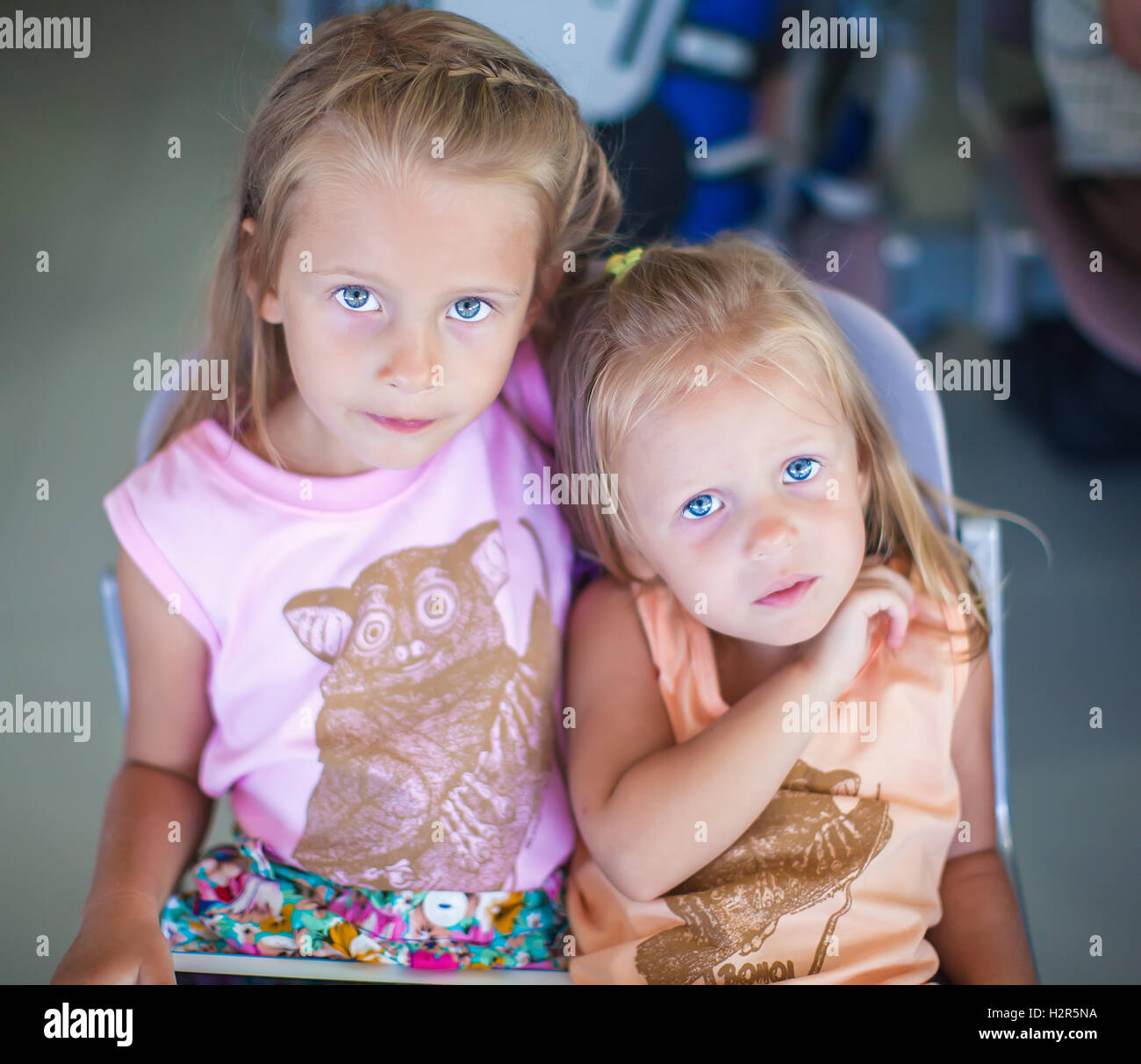 Portrait of two little beautiful blue-eyed girls Stock Photo - Alamy