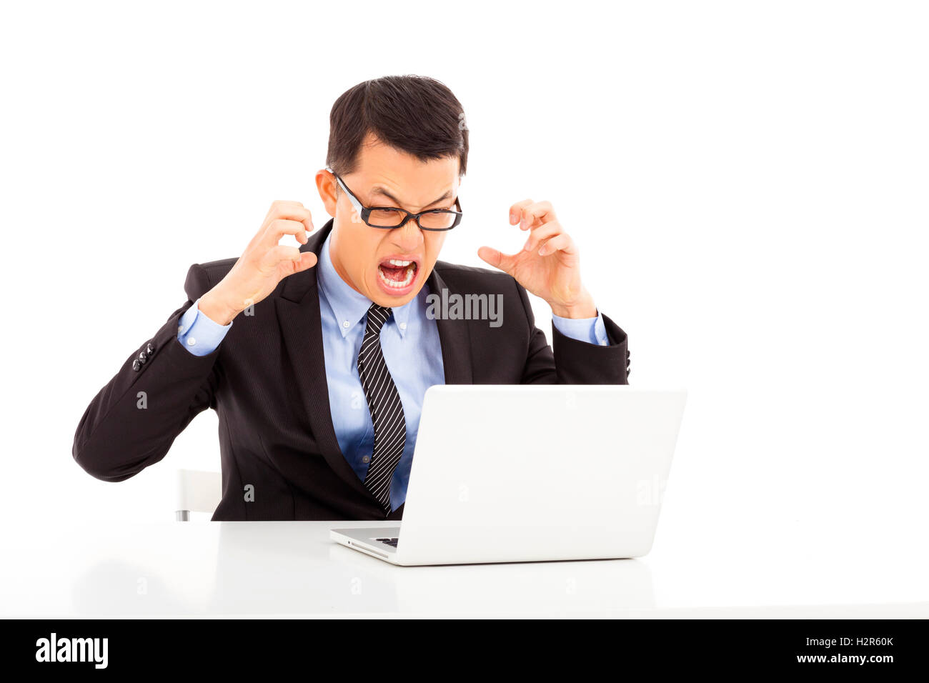 Young man laptop feeling angry hi-res stock photography and images - Alamy