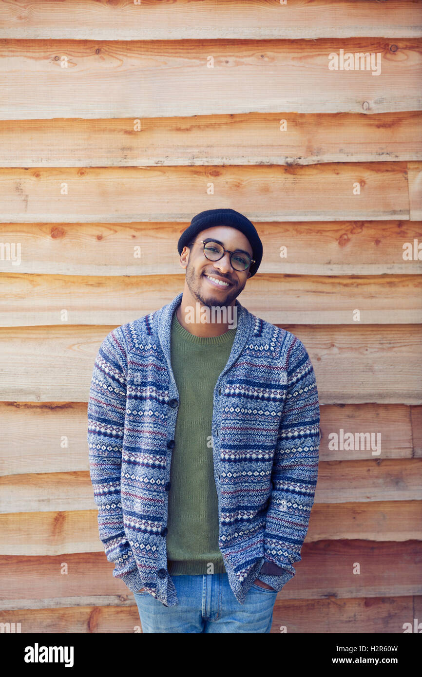 Portrait smiling man outside cabin Stock Photo - Alamy