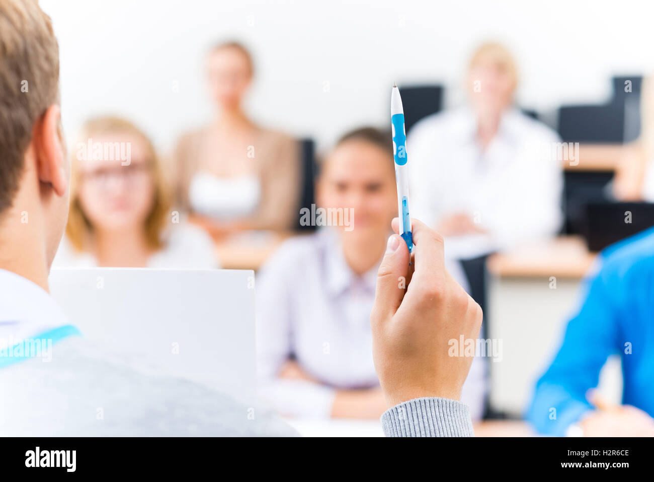 close-up of hands of a teacher with a pen Stock Photo - Alamy