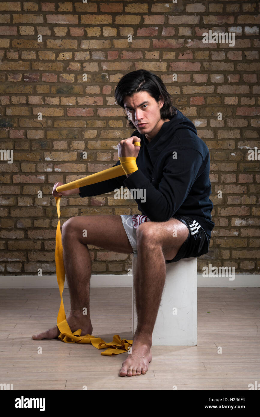 Asian man boxer sitting hi-res stock photography and images - Alamy
