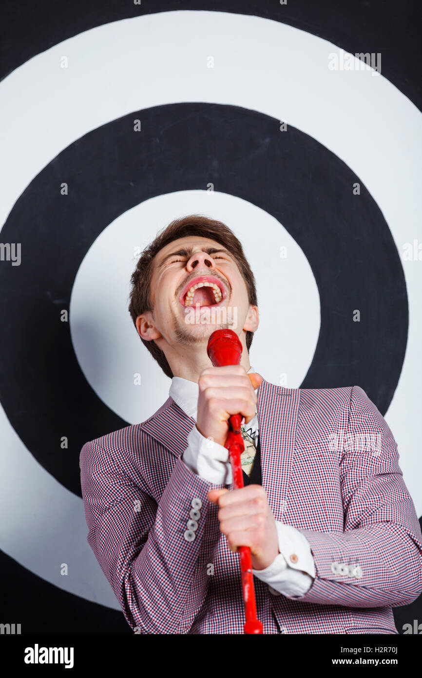 the man is singing with Stock Photo - Alamy