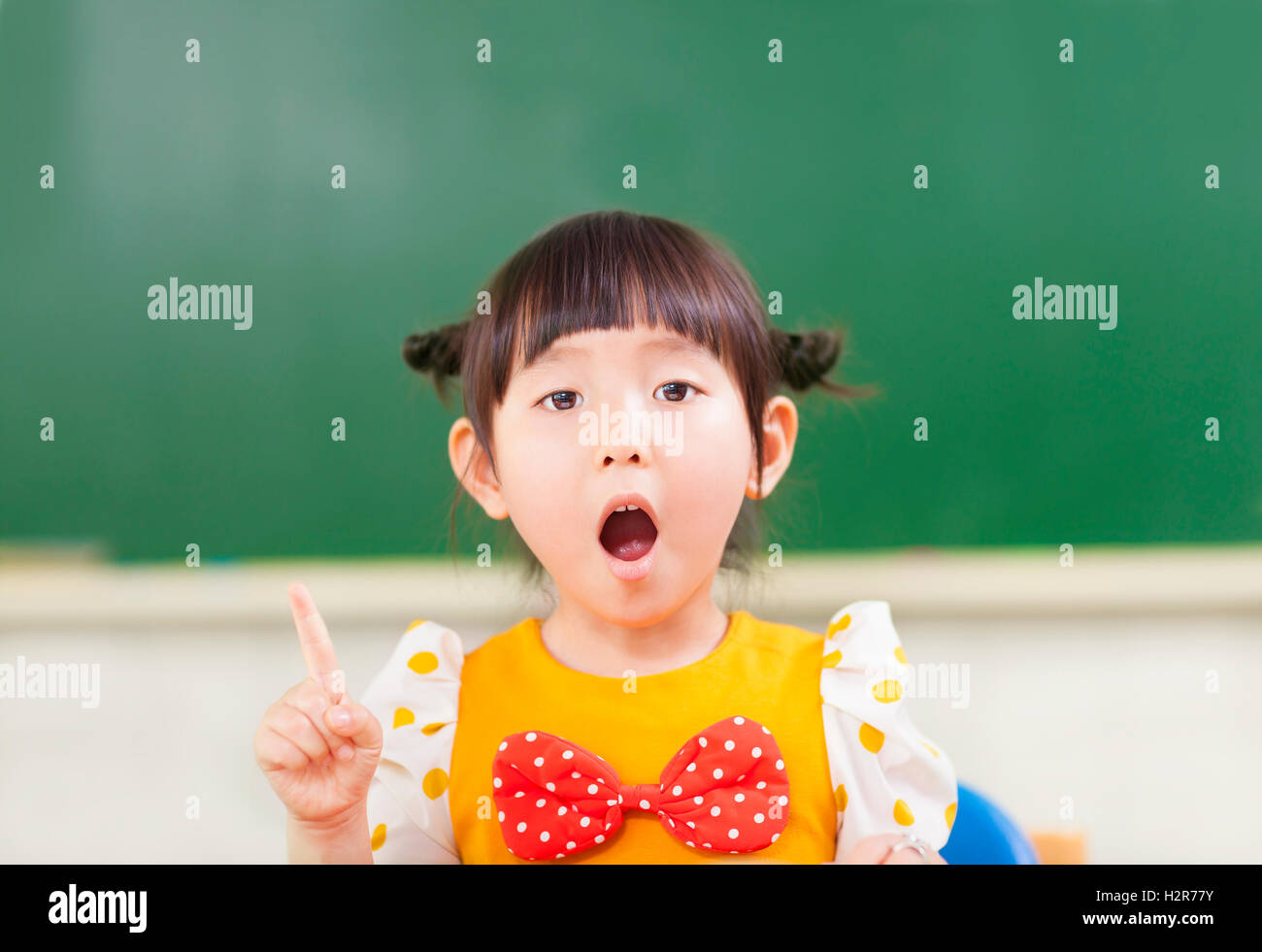 little girl think out a good ideas Stock Photo - Alamy