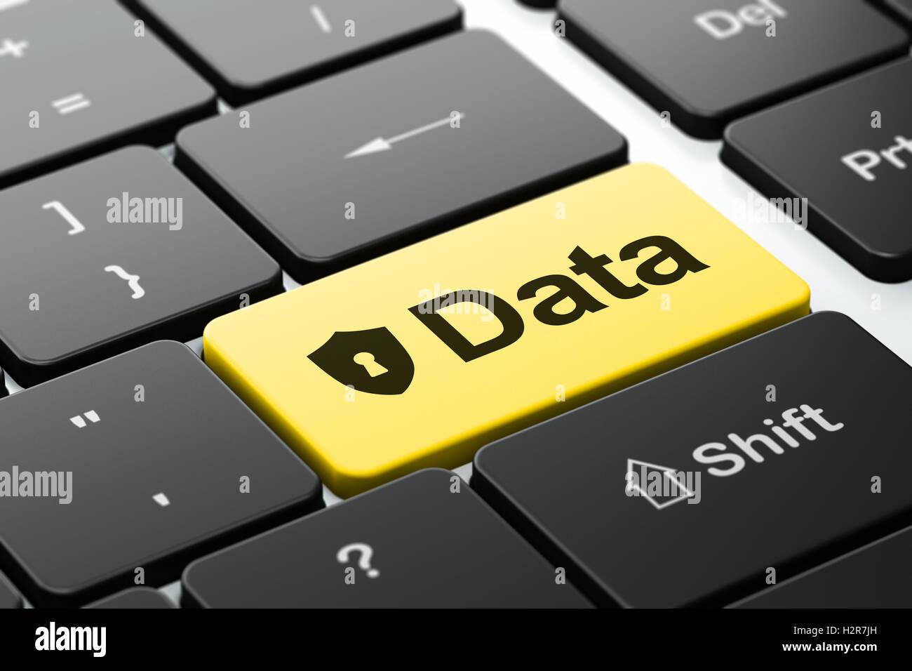 Information concept: Shield With Keyhole and Data on computer keyboard ...