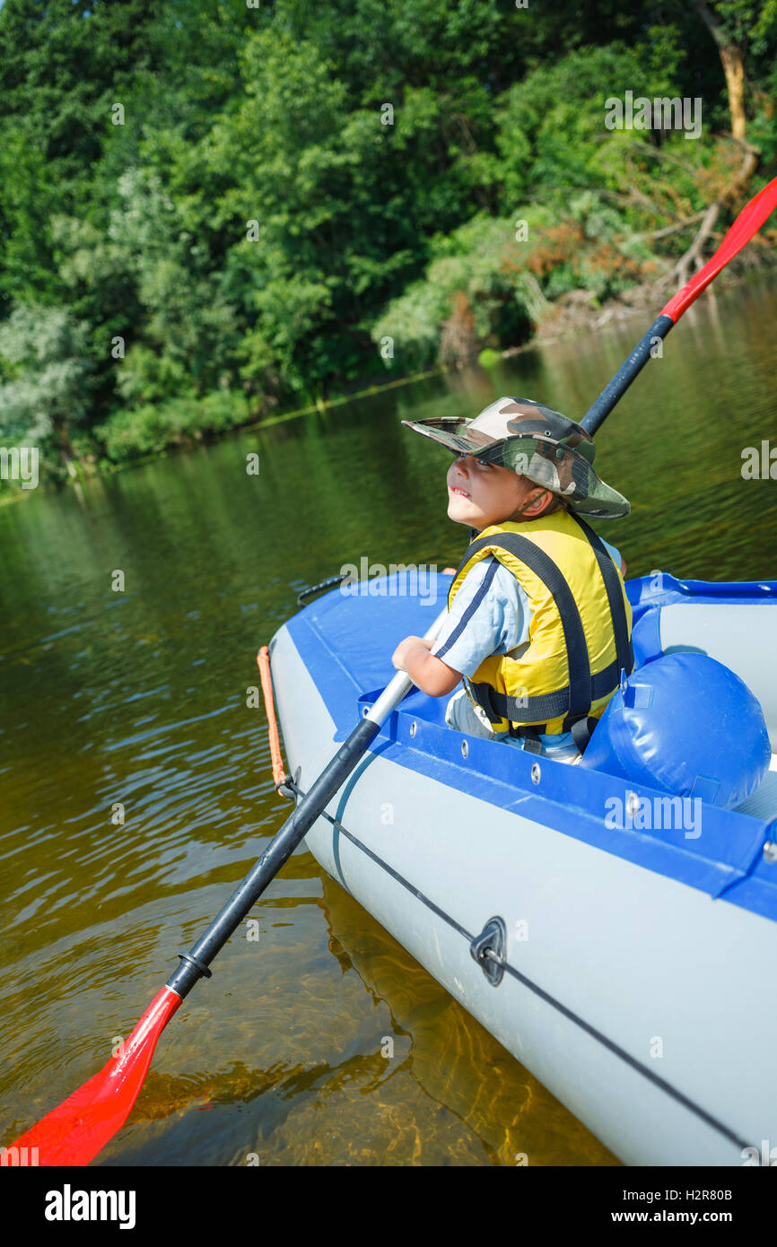 Boy life vest kayak paddle hi-res stock photography and images - Alamy