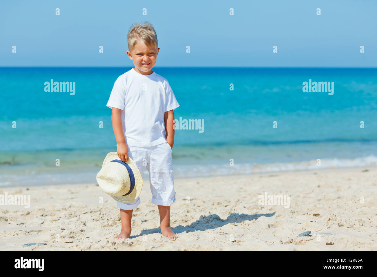 Boy on the beach Stock Photo - Alamy