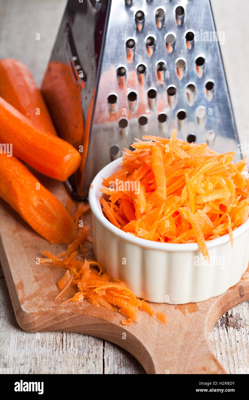 metal grater and carrot Stock Photo - Alamy