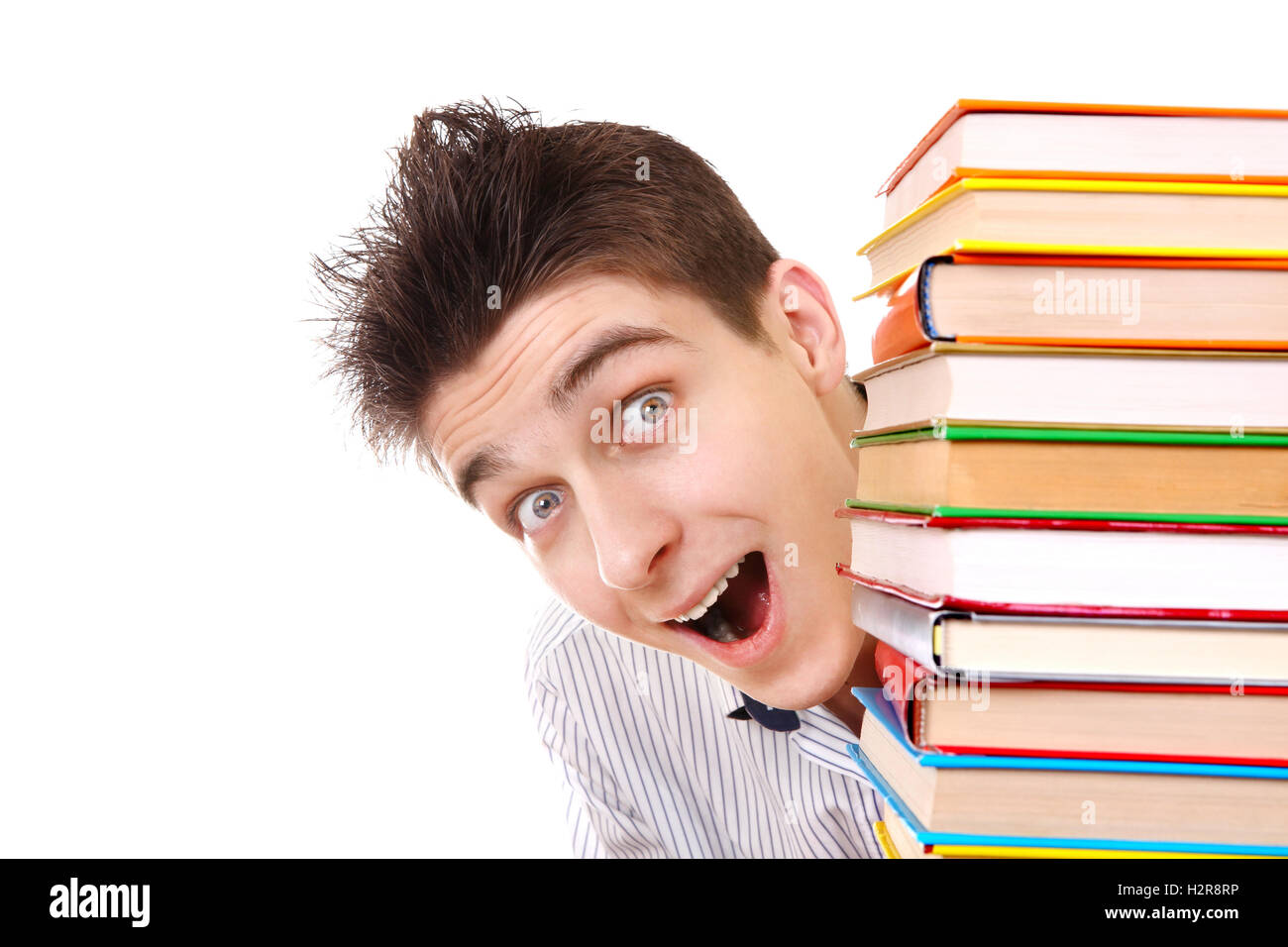 Cheerful Student behind the Books Stock Photo - Alamy