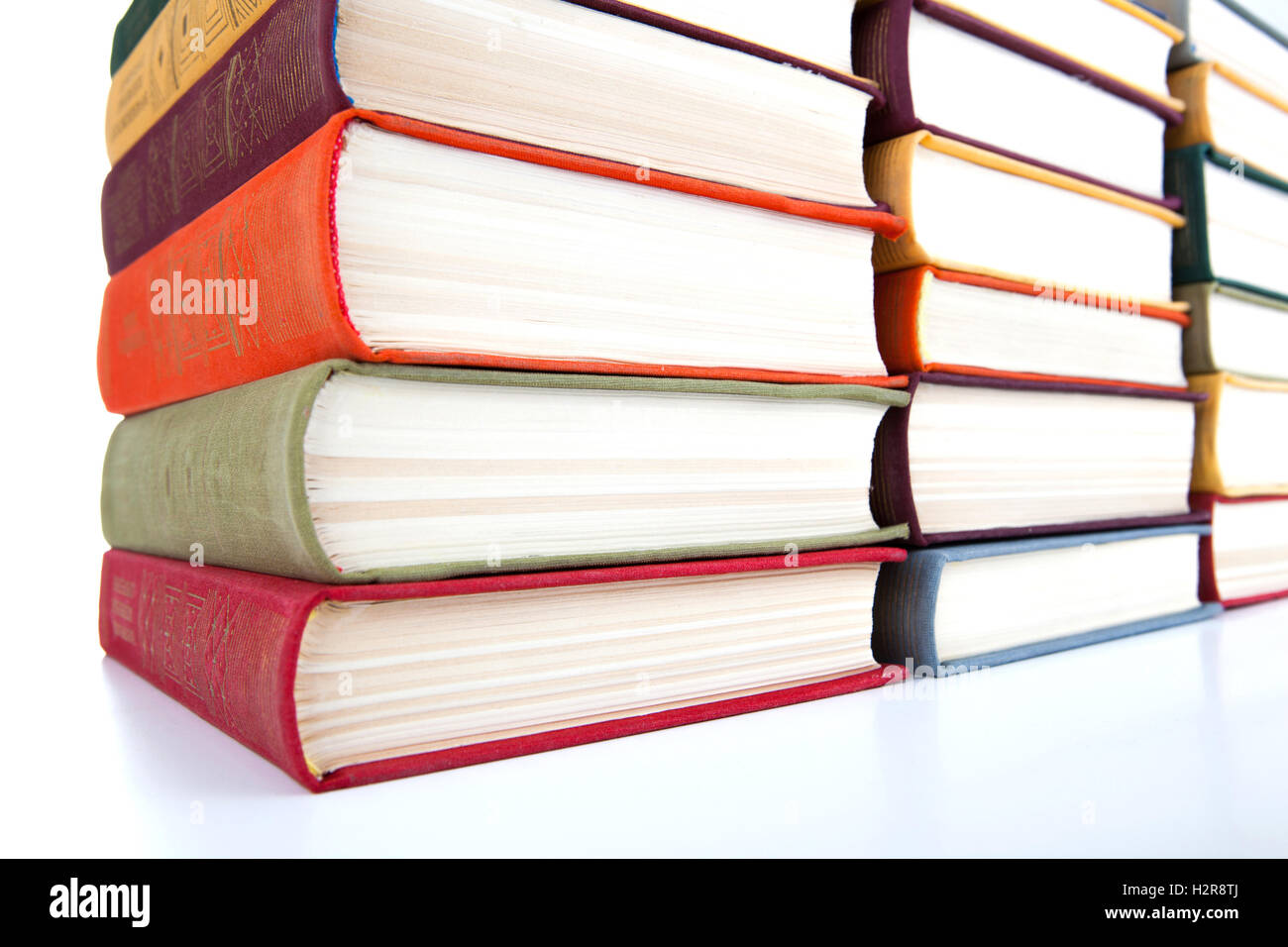 stack of books on white Stock Photo - Alamy