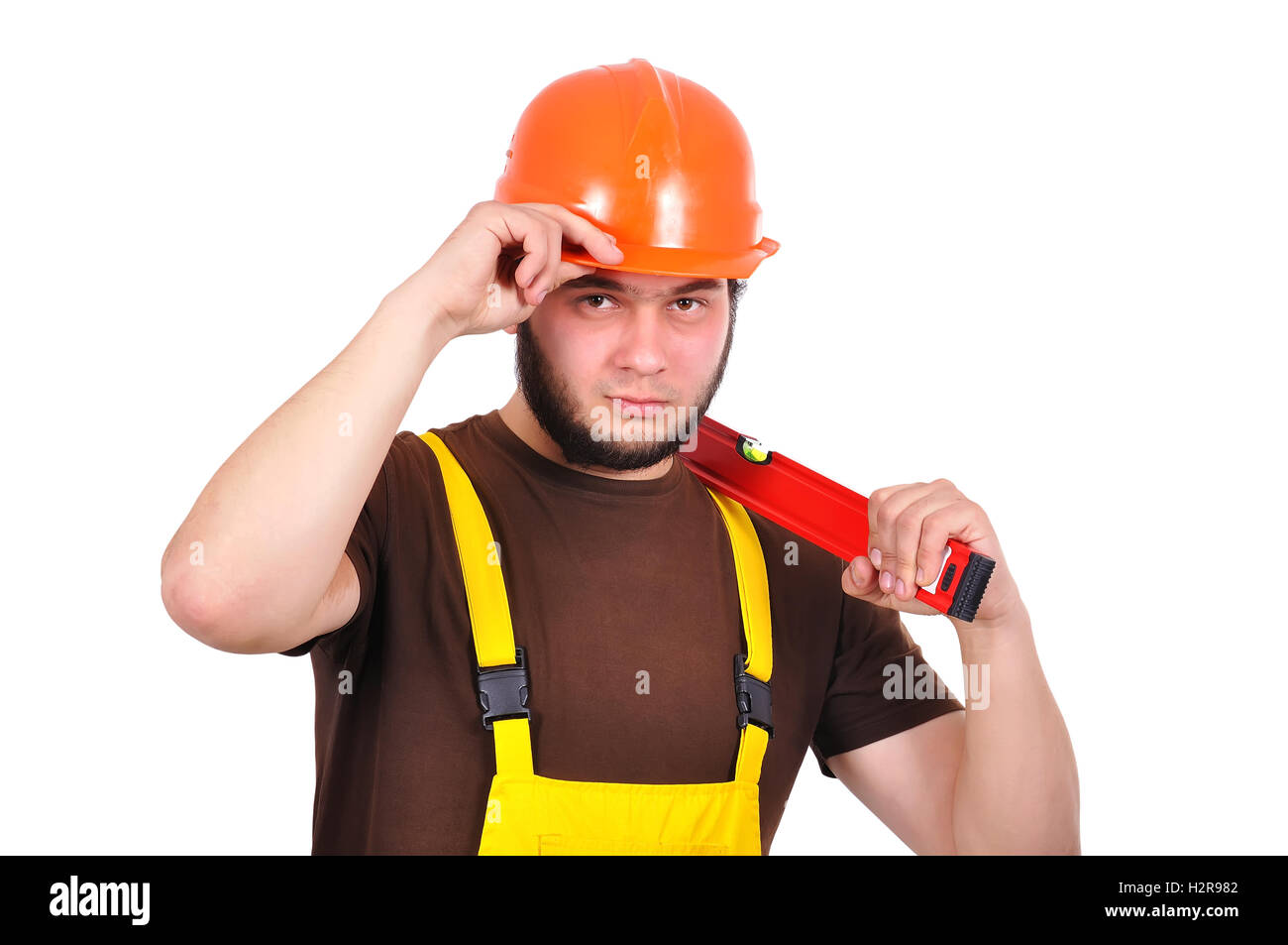 builder holding water level Stock Photo - Alamy