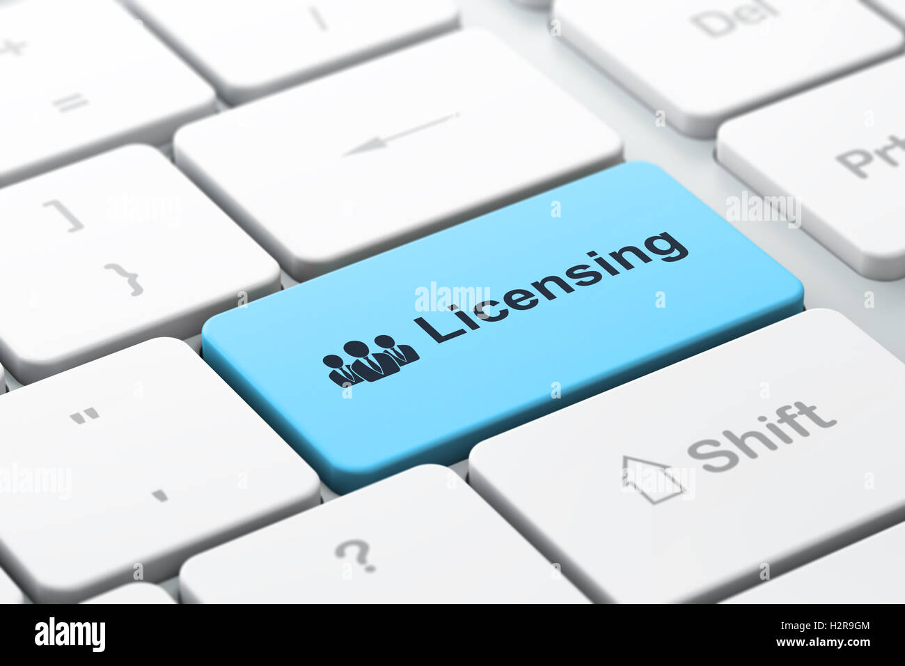 Law concept: Business People and Licensing on computer keyboard ...