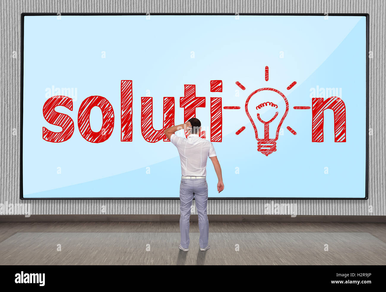 men looking at solution symbol Stock Photo - Alamy