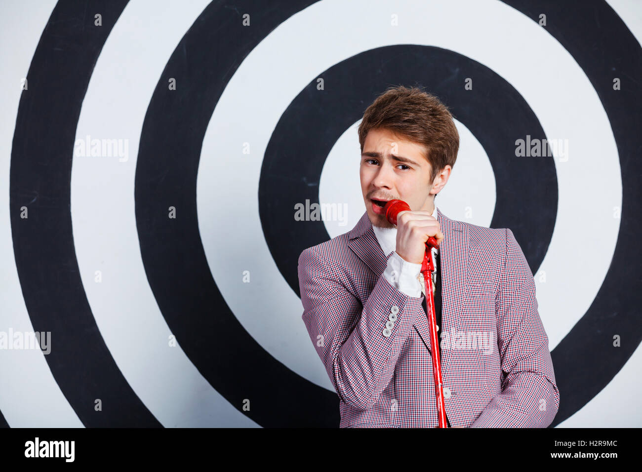 the man is singing with Stock Photo - Alamy