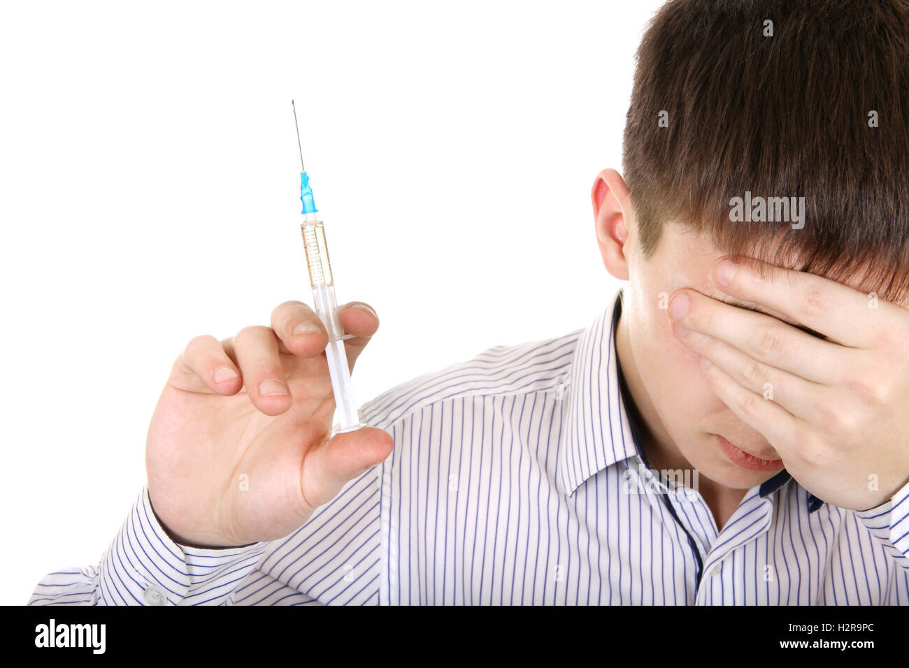 Sad Teenager with Syringe Stock Photo - Alamy