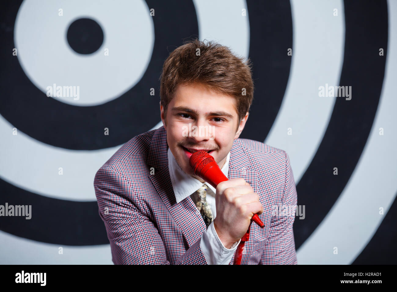 the man is singing with Stock Photo - Alamy