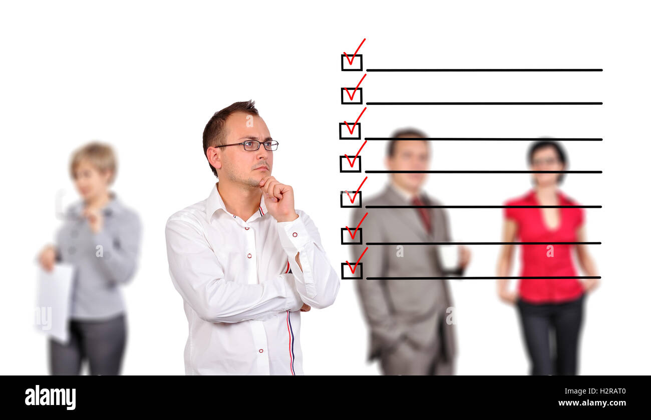 man looking at check box Stock Photo - Alamy