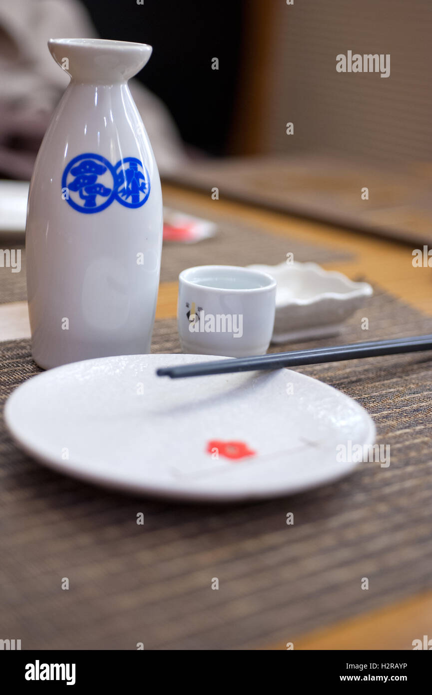 Japanese style table set and sake Stock Photo - Alamy