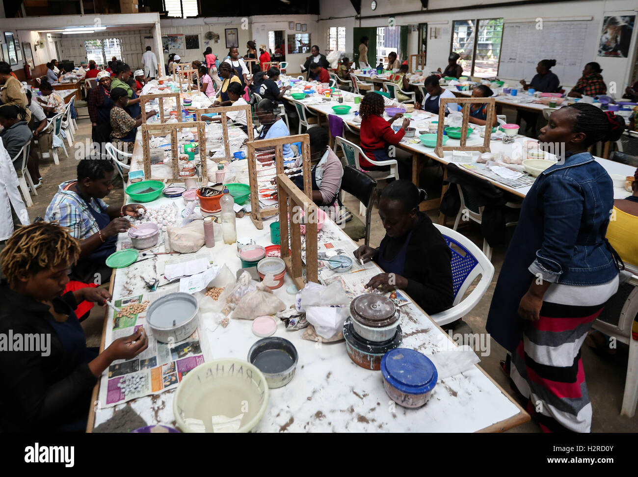 Nairobi, Kenya. 30th Sep, 2016. Staff members work at the Kazuri ...