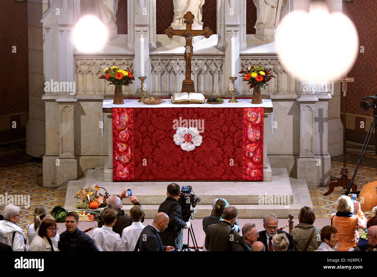 Wittenberg, Germany. 2nd Oct, 2016. A red altar hanging from Queen ...