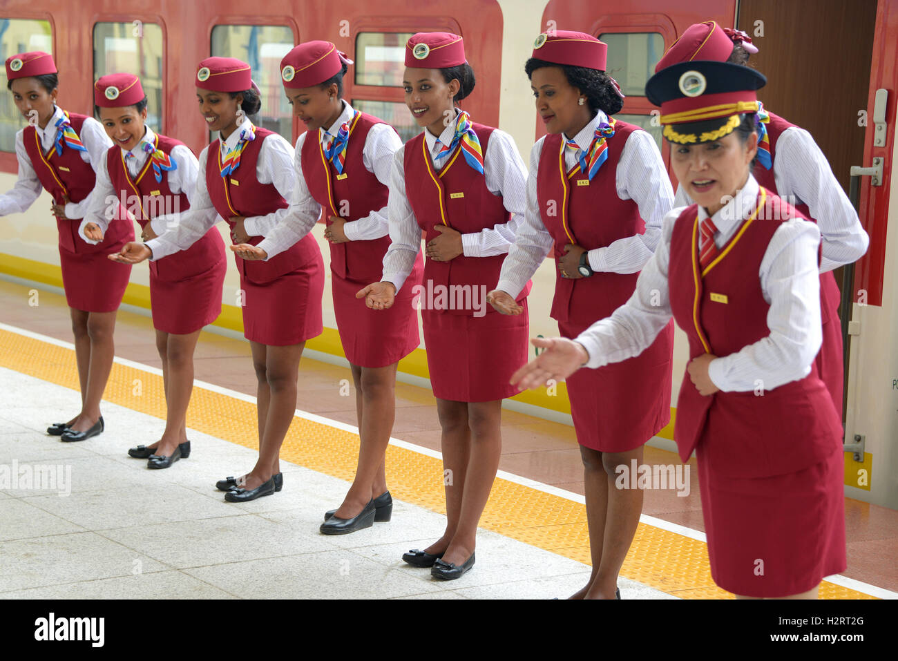 Addis Ababa, Ethiopia. 1st Oct, 2016. Chinese conductor Ding Jihua (R ...