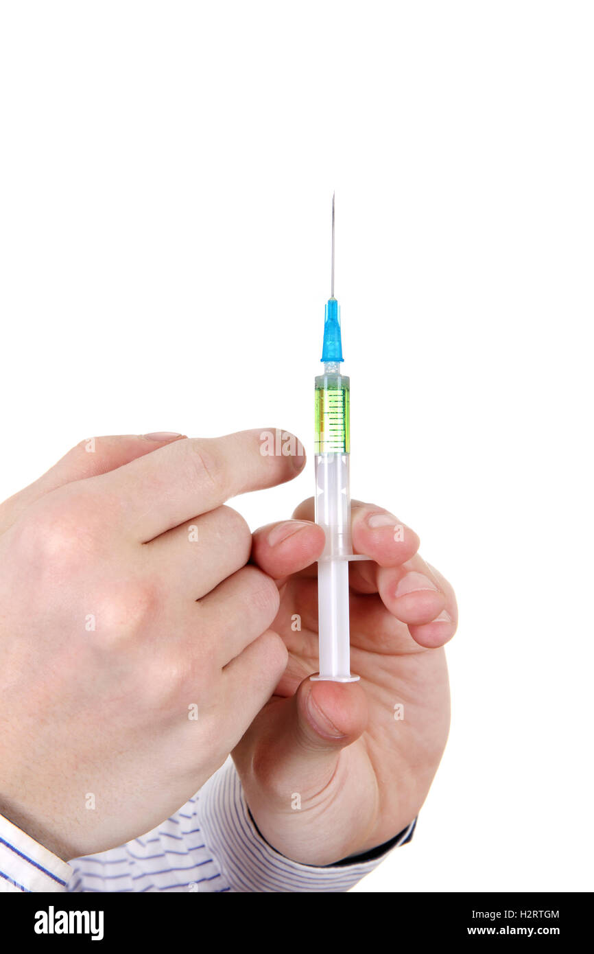 Syringe in a Hand Stock Photo - Alamy