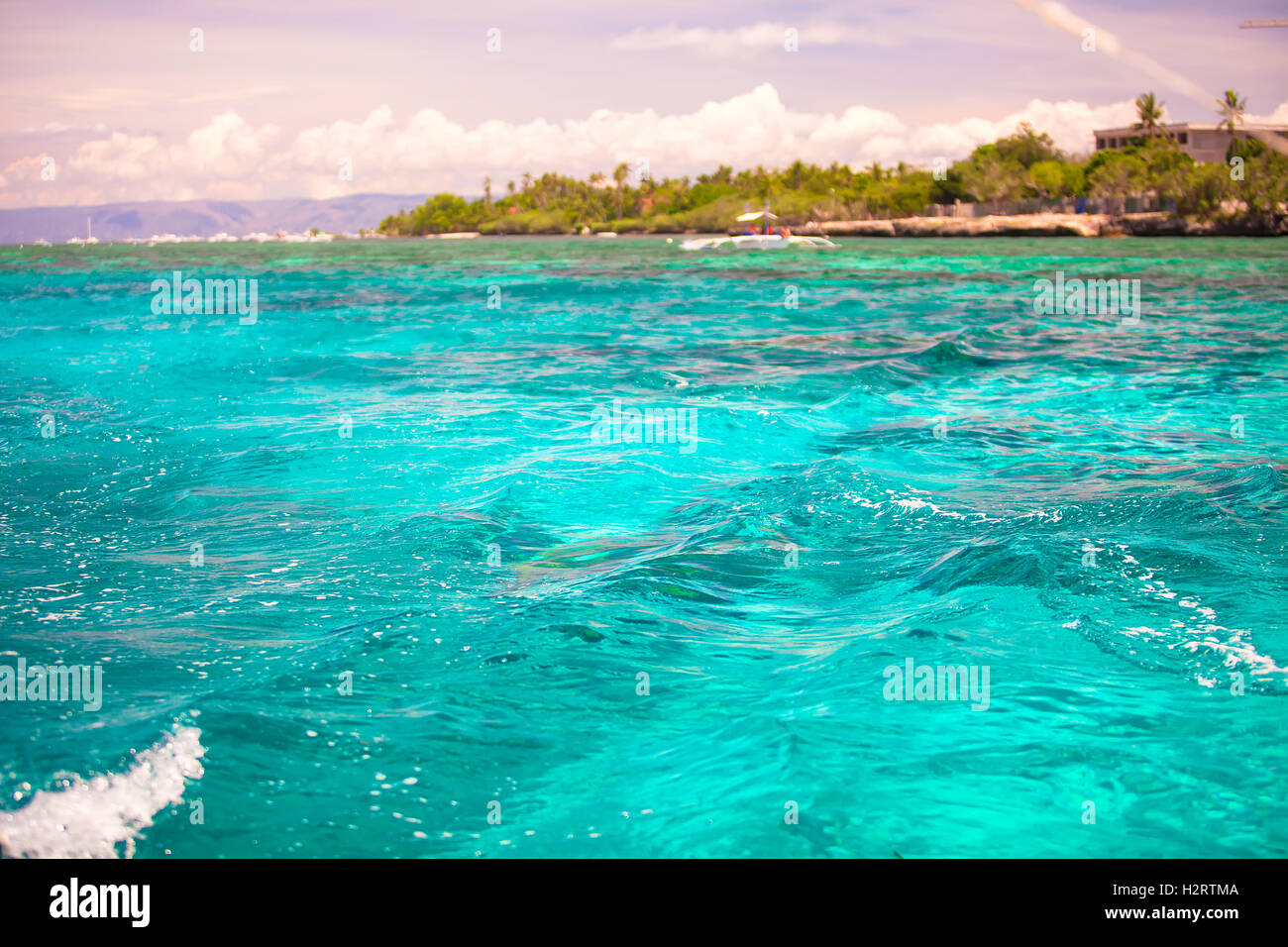 Incredibly clean turquoise water in the sea near tropical island Stock ...