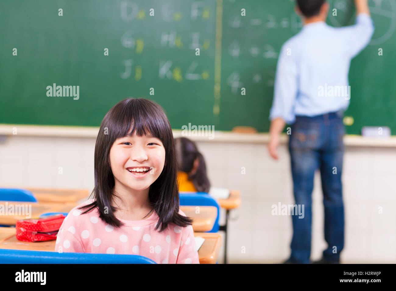 happy schoolchildren looking at camera Stock Photo - Alamy