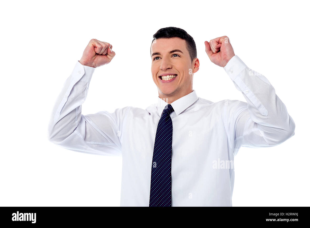 Excited young handsome man Stock Photo - Alamy