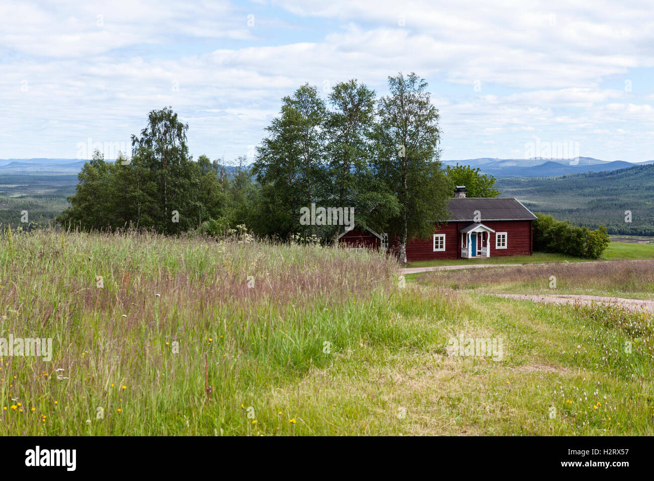 HARJEDALEN, SWEDEN ON JULY 07, 2016. View over buildings, gravel road ...